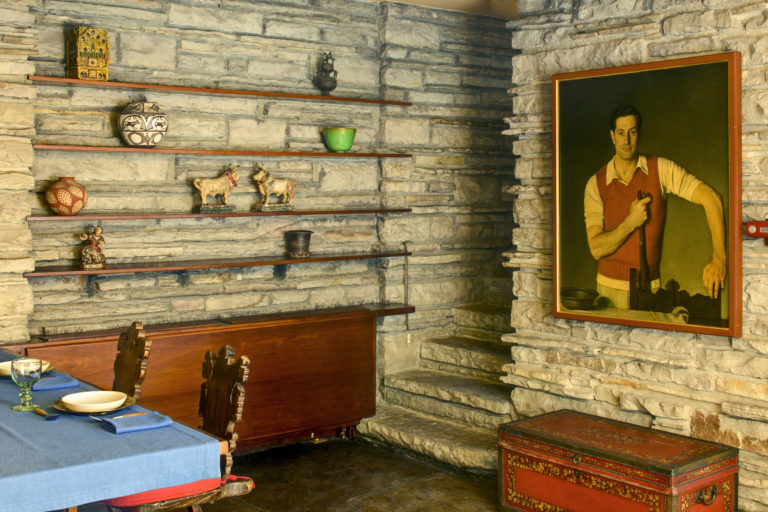The portrait of Edgar Kaufmann, Sr. hangs in the dining area - Fallingwater
